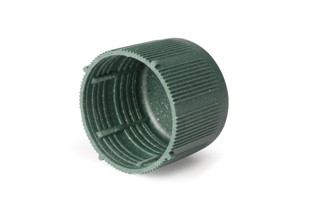 DLM tappi - Production of caps in recycled plastic